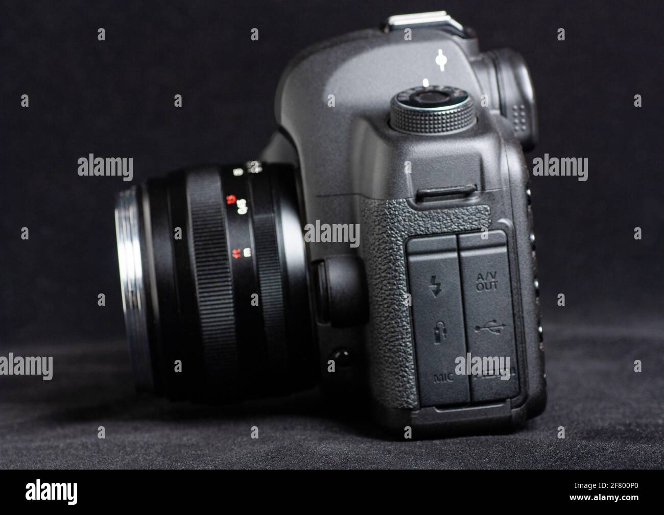 DSLR camera on black background Stock Photo - Alamy