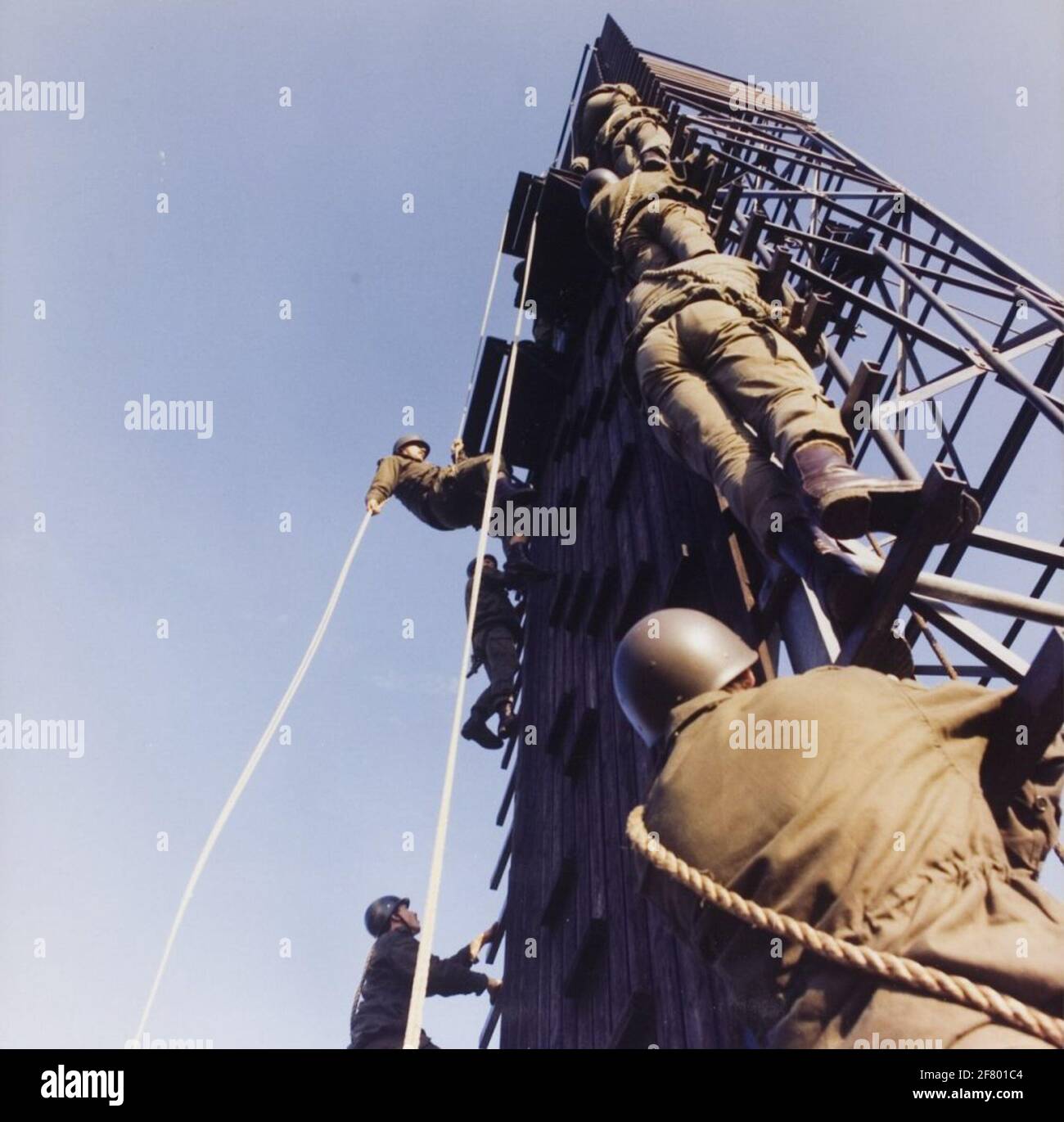 Soldiers in action on the climbing tower of the command troops in ...