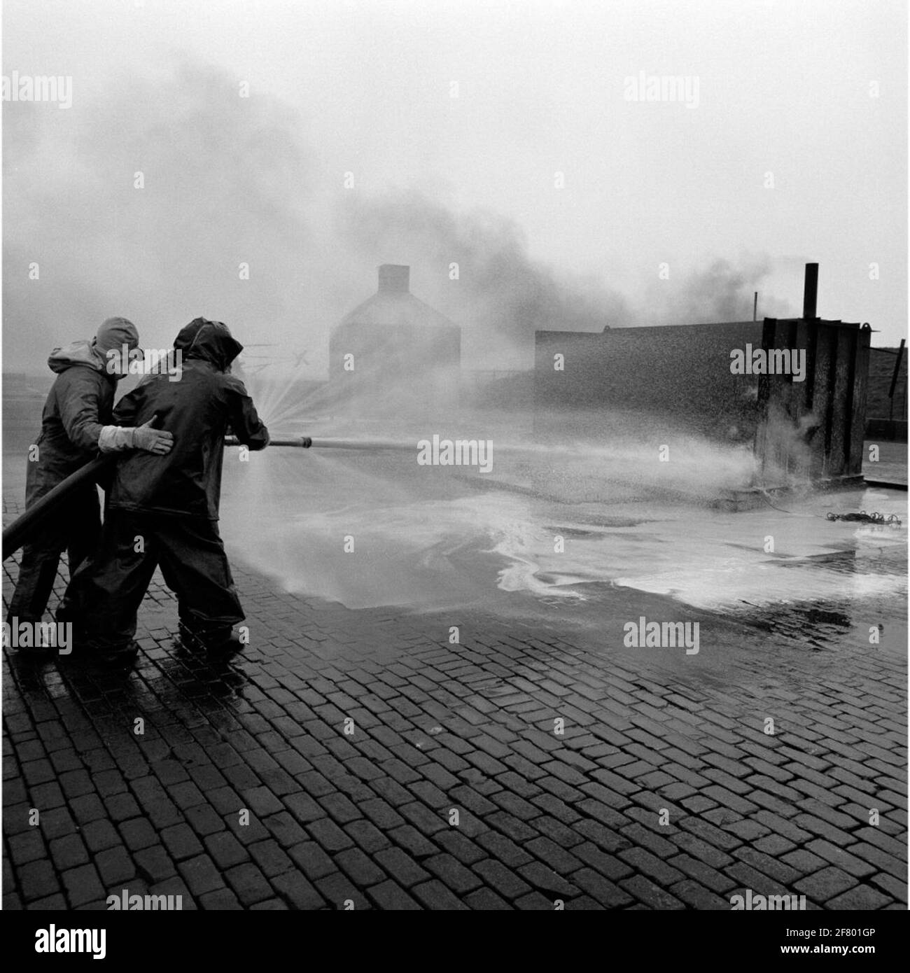 Exercise fire fighting at the school for NBCD (nuclear, organic ...