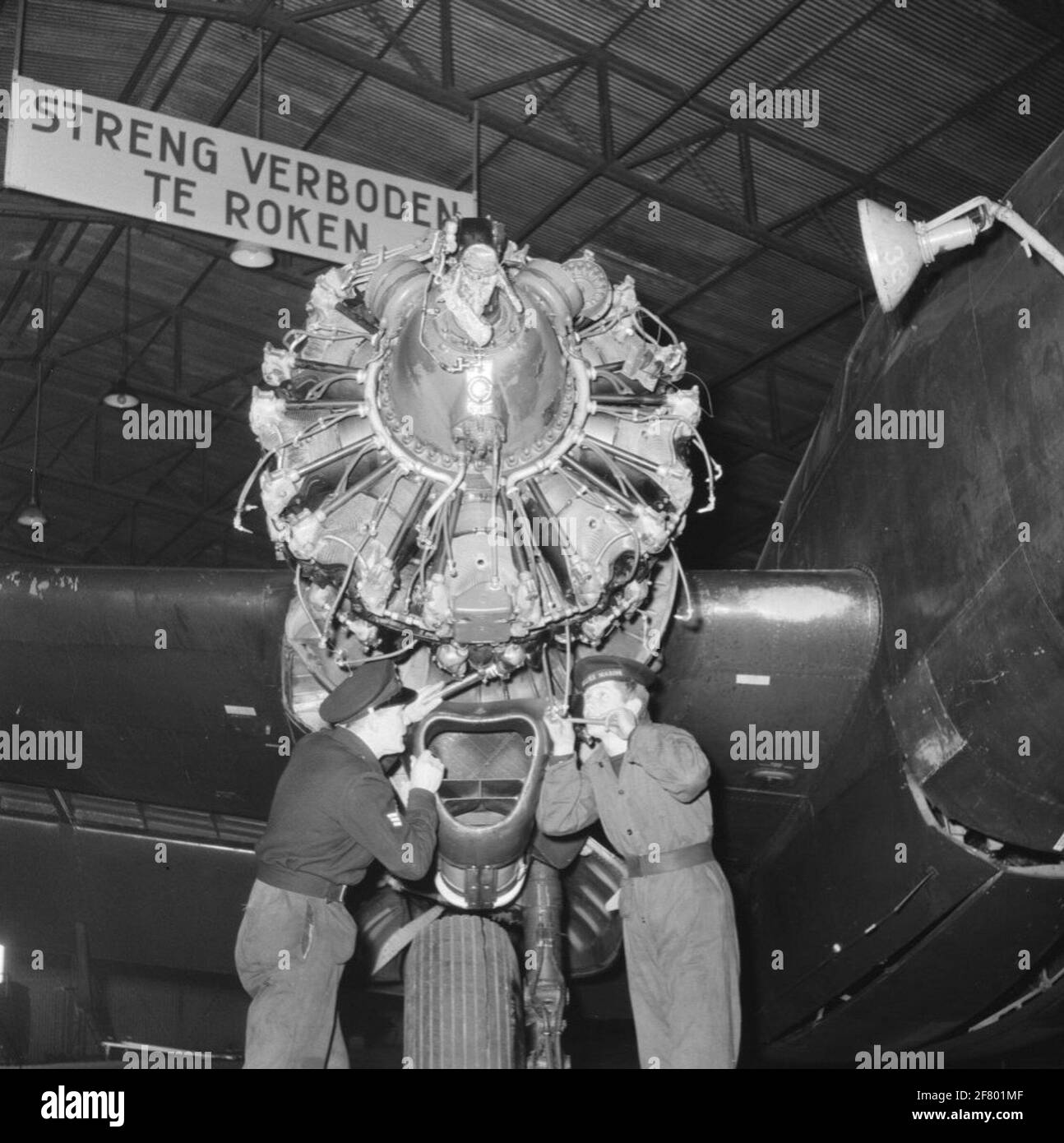 Airplane maker in training at the engine of a harpoon. Is part of ...
