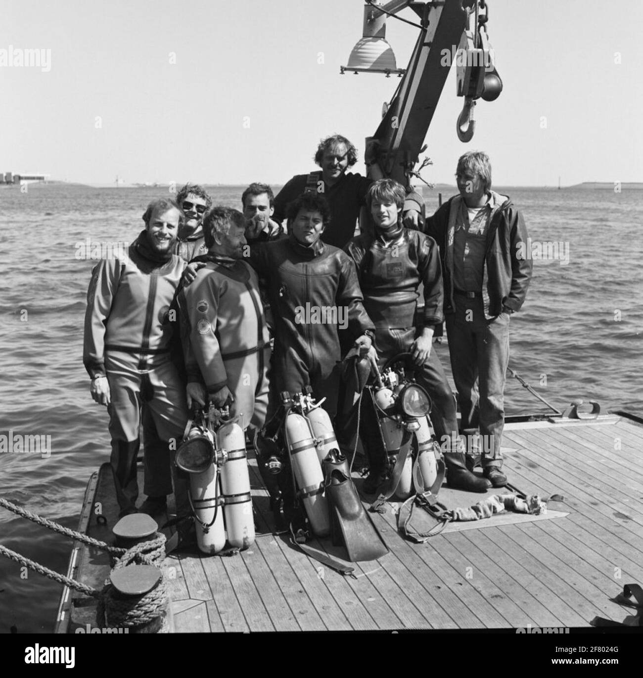 Group of divers with scubapro dive equipment together with support ...