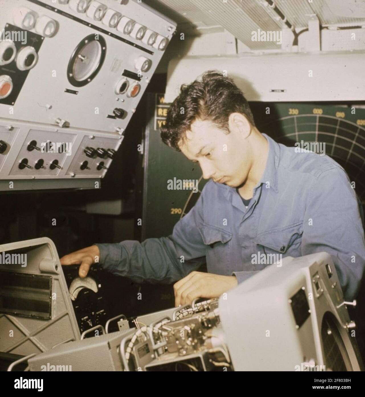 Work on board. Probably a radio radar engineer Stock Photo - Alamy