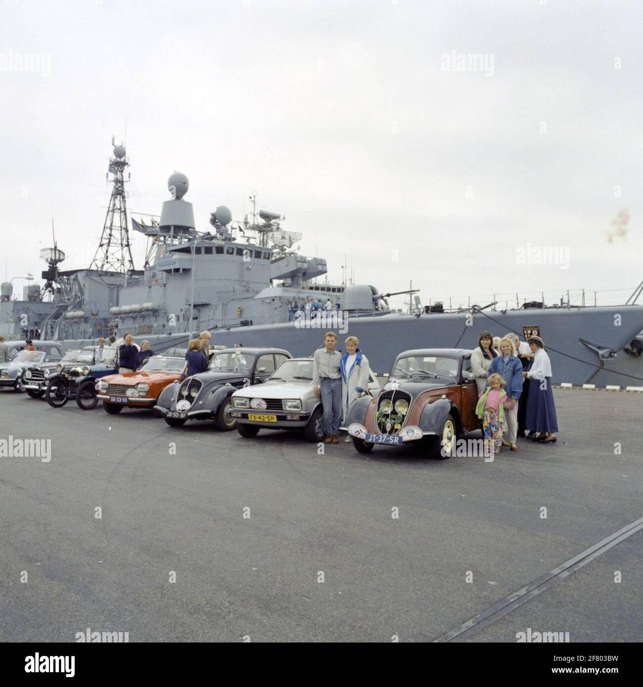 Oldtimers on the quay arranged with Frigates and Destroyers in the ...