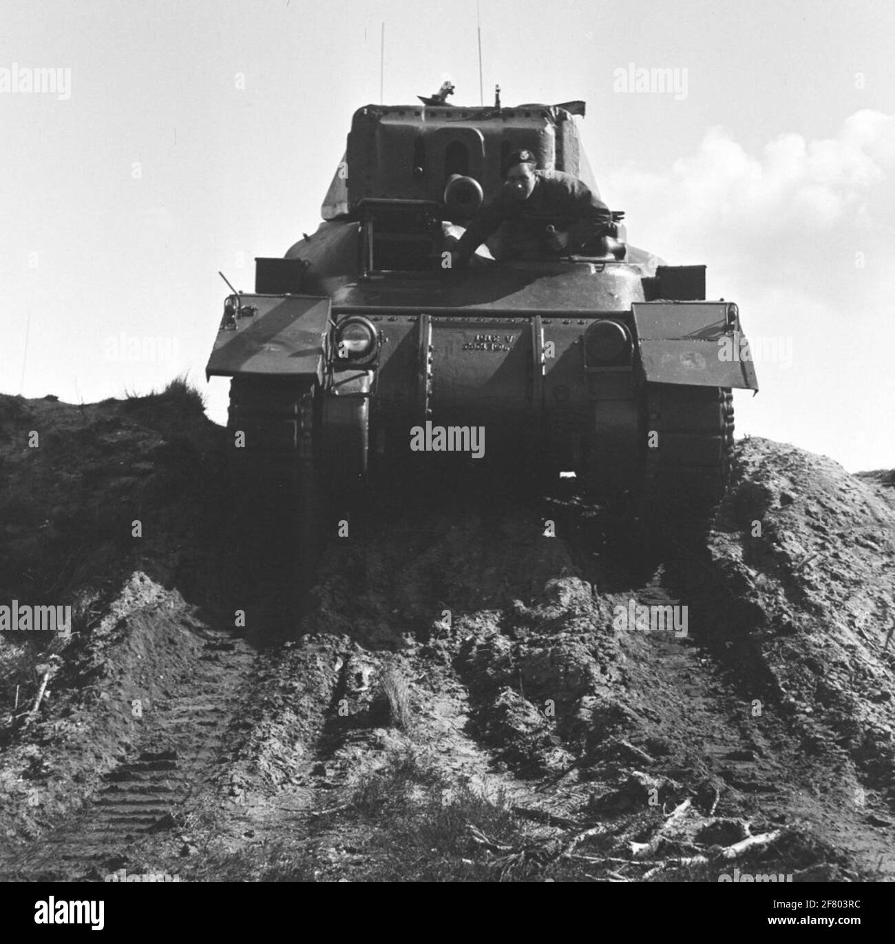 A medium combat tank of the RAM II type drops slope. The auxiliary ...