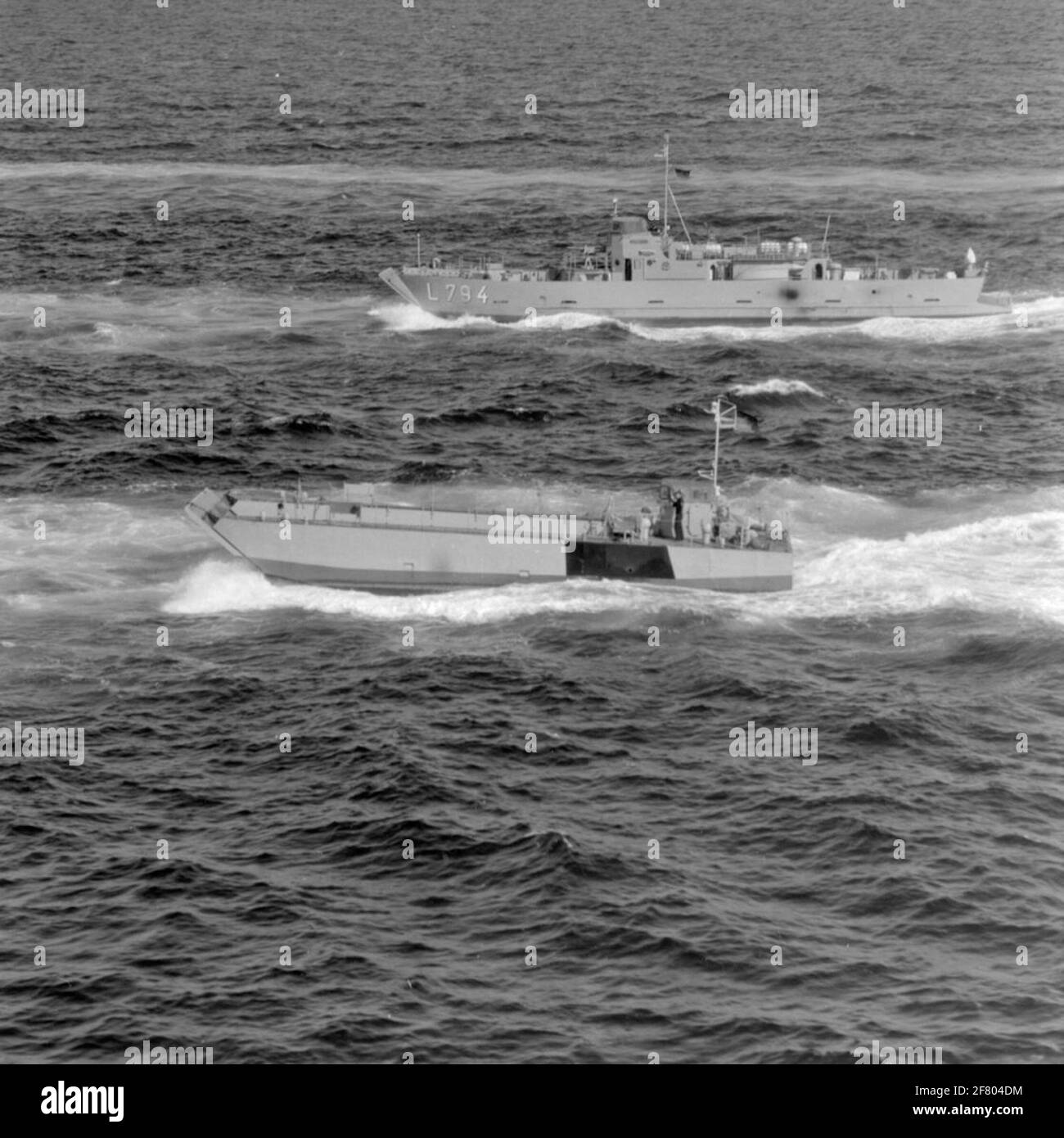 German mine sweeps and landing boats at sea Stock Photo - Alamy