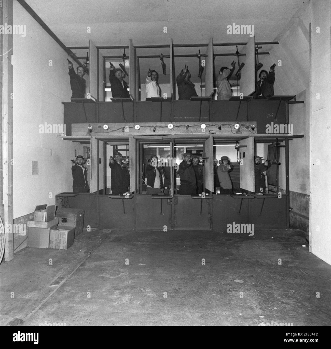 Pistol shooters on the shooting range in the bunker at the Princess ...