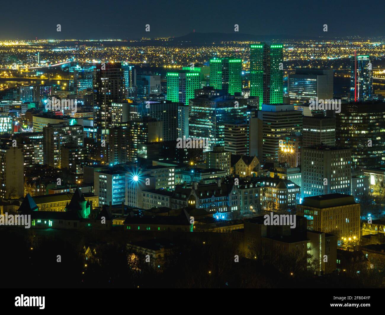 high view of a city at night with tall buildings Stock Photo - Alamy