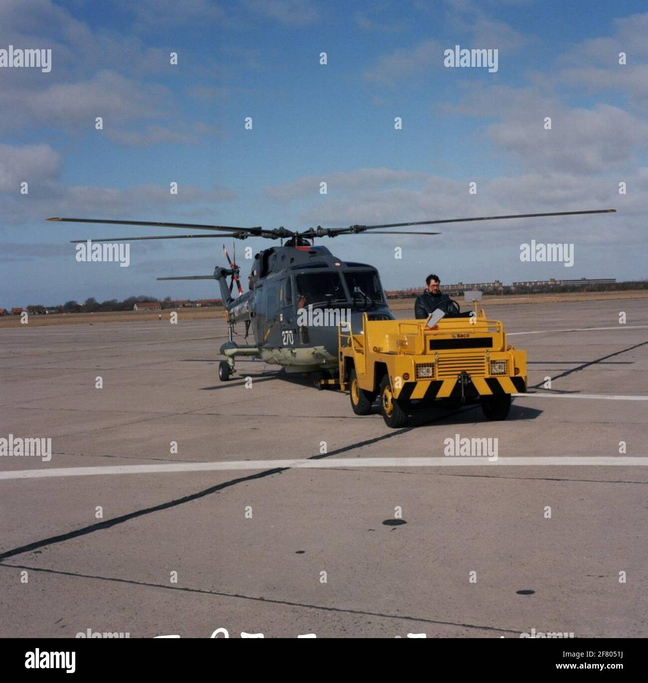 New SACO airplane tractor drags a Westland Lynx Helicopter at the Kooy ...
