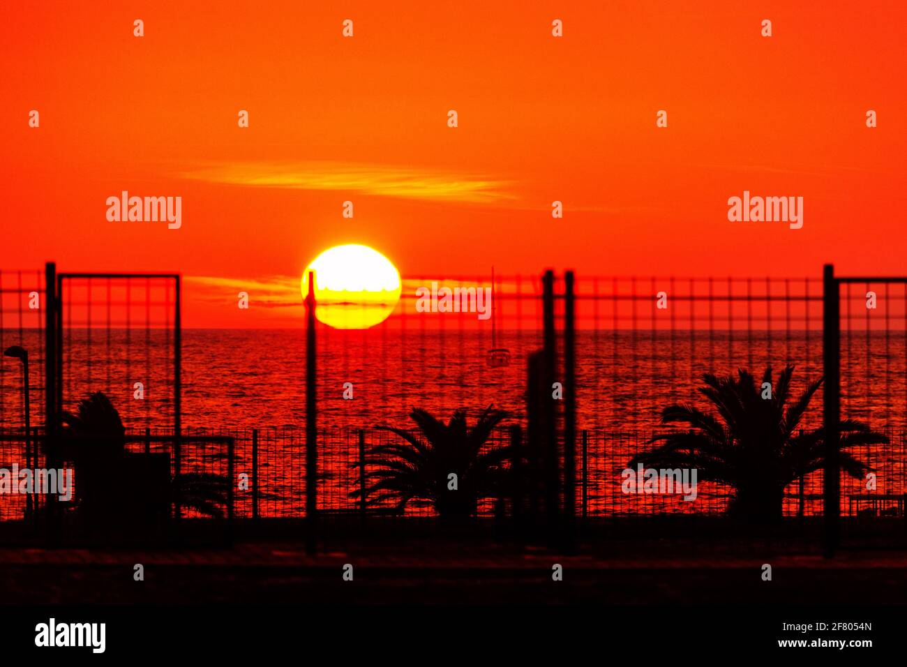 Big Sun over the tropical sea . Spectacular Tropical sundown . Coastal ...