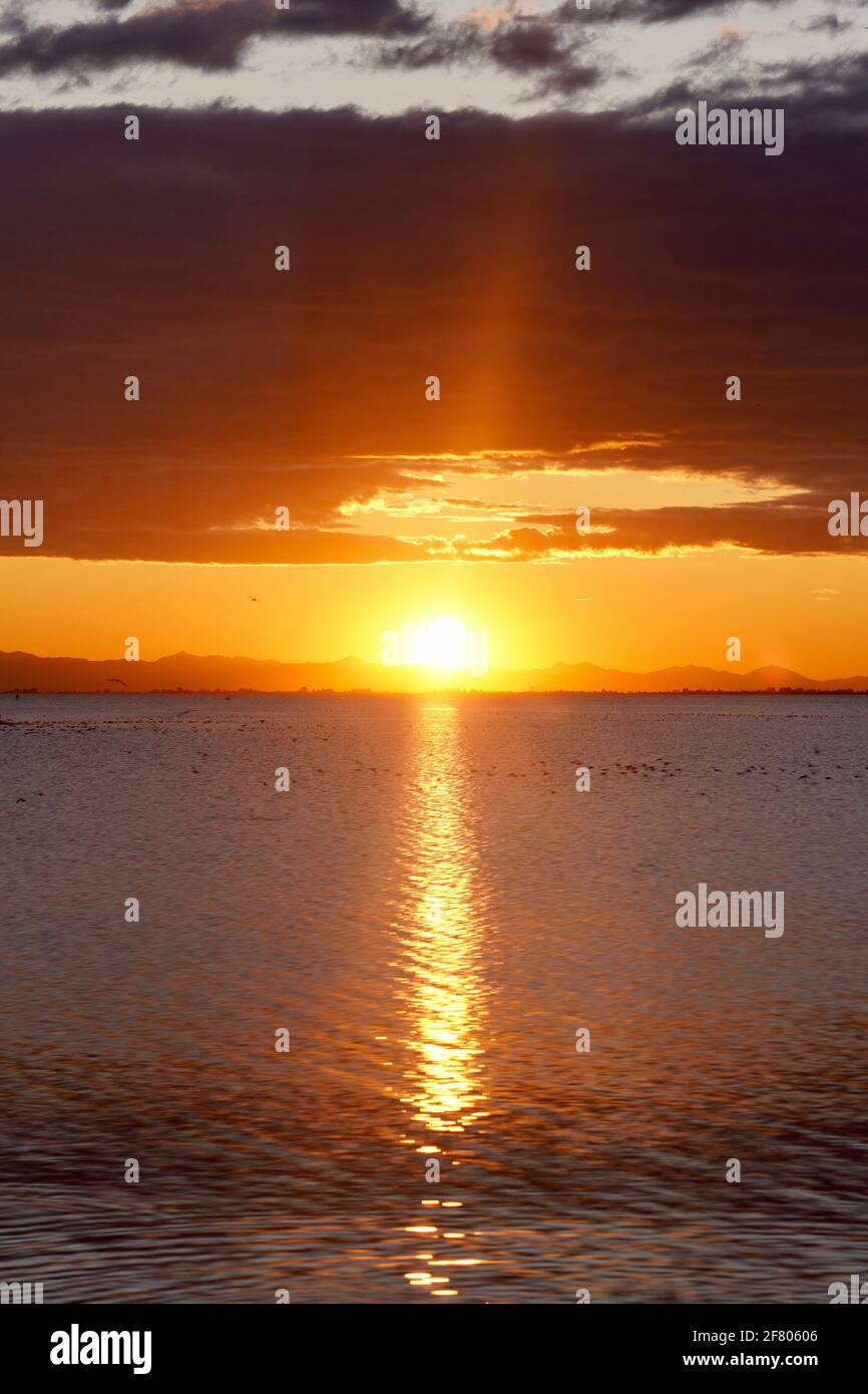Beautiful sunset in Semiahmoo bay, BC, Canada, with sunlight shining on ...