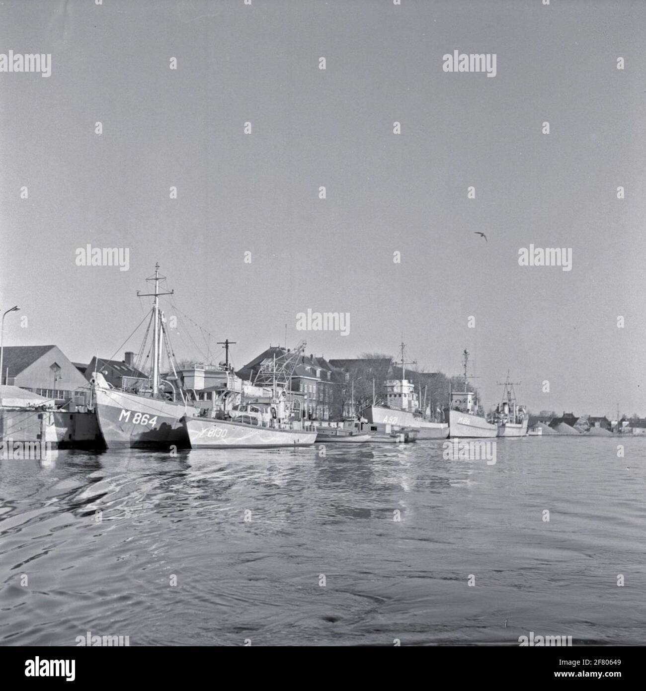 Mine sweeps moored at the mine service barracks Stock Photo - Alamy