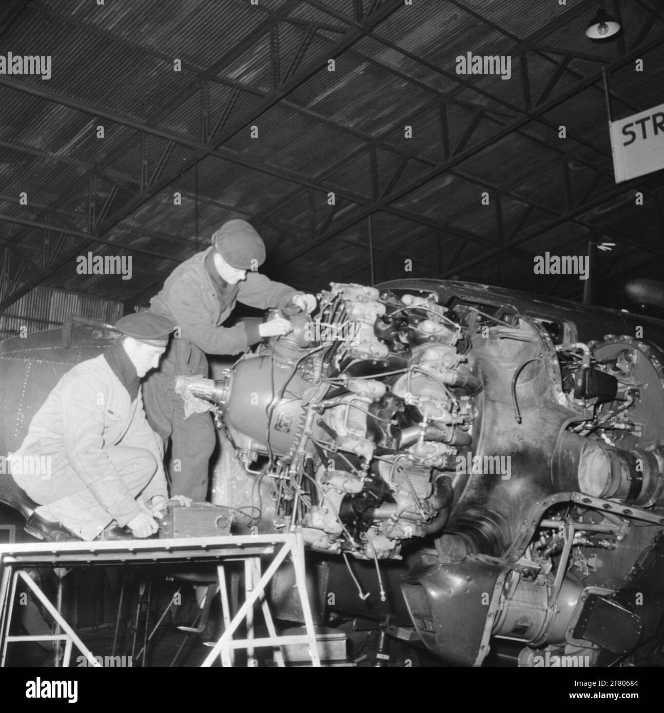 Airplane maker in training at the engine of a harpoon. Is part of ...