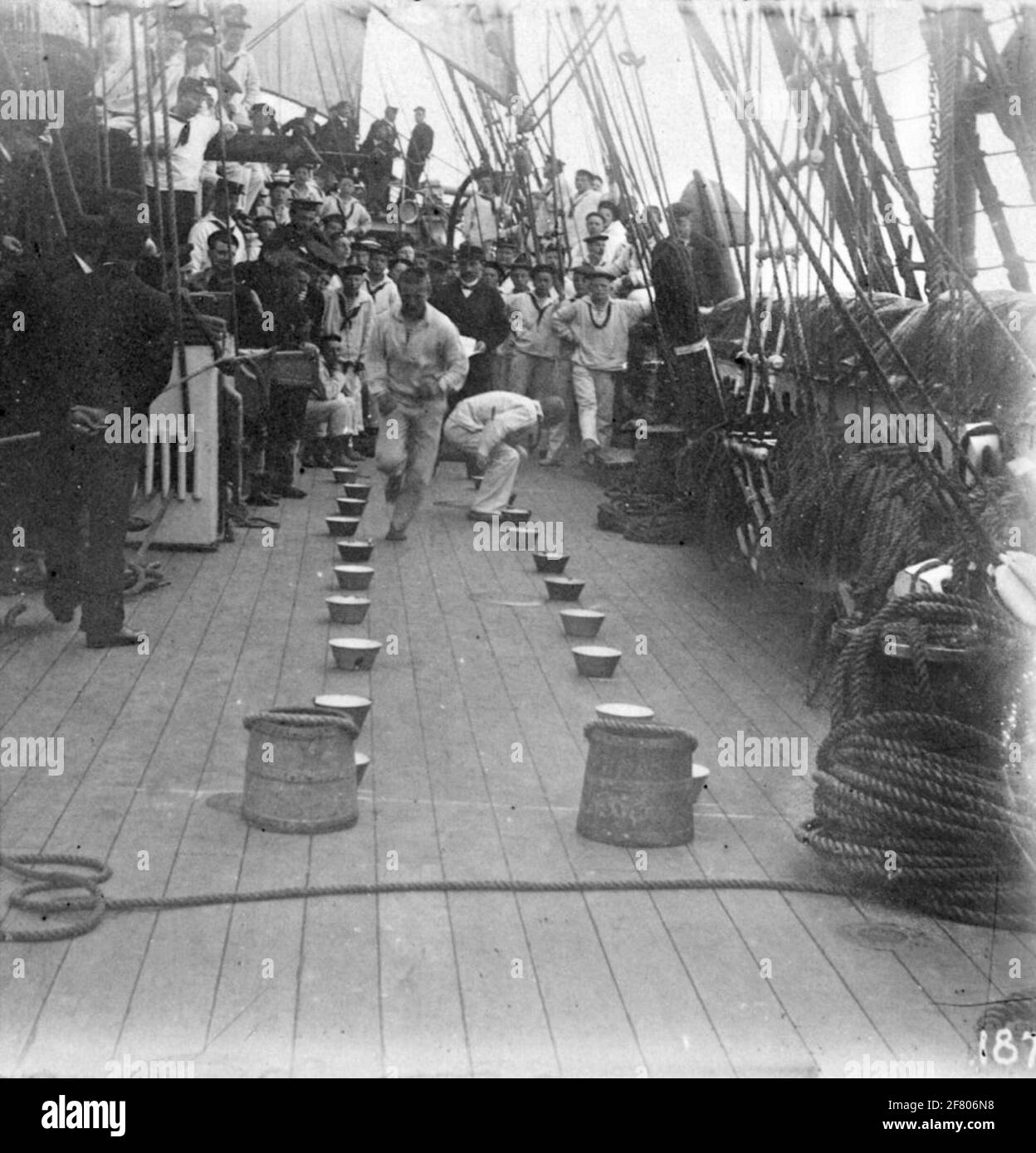 Buckets fill race by boys in training to land on board HR. Ms. Nautilus ...