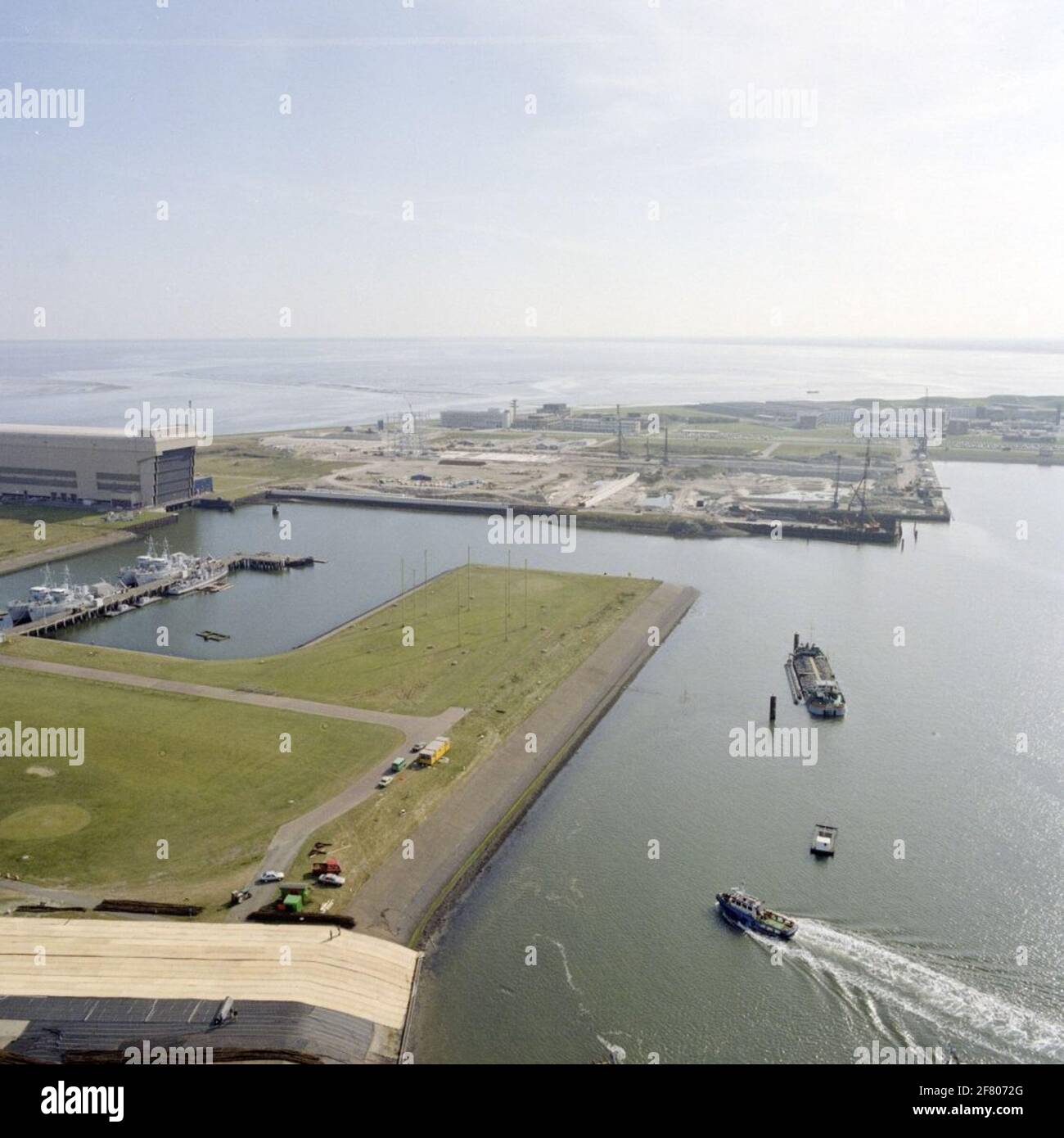 Aerial view of the new port Den Helder. On the left the covered dock of ...