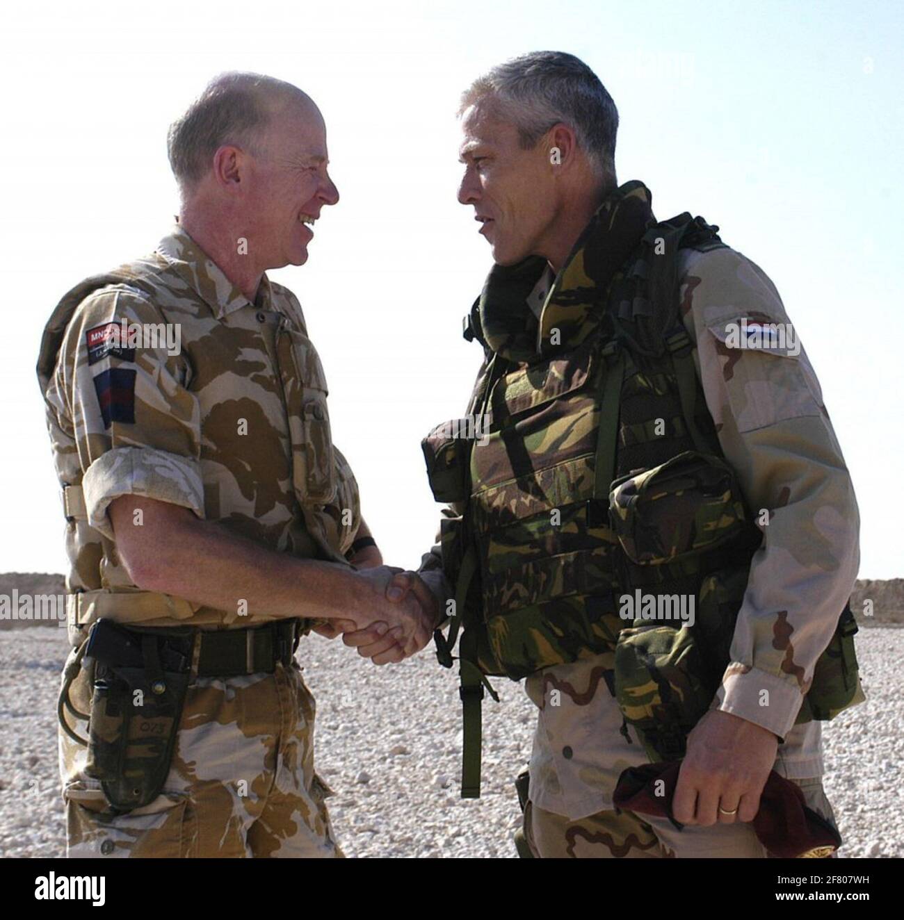 An English officer of the Multi National Division (South-East) and a ...