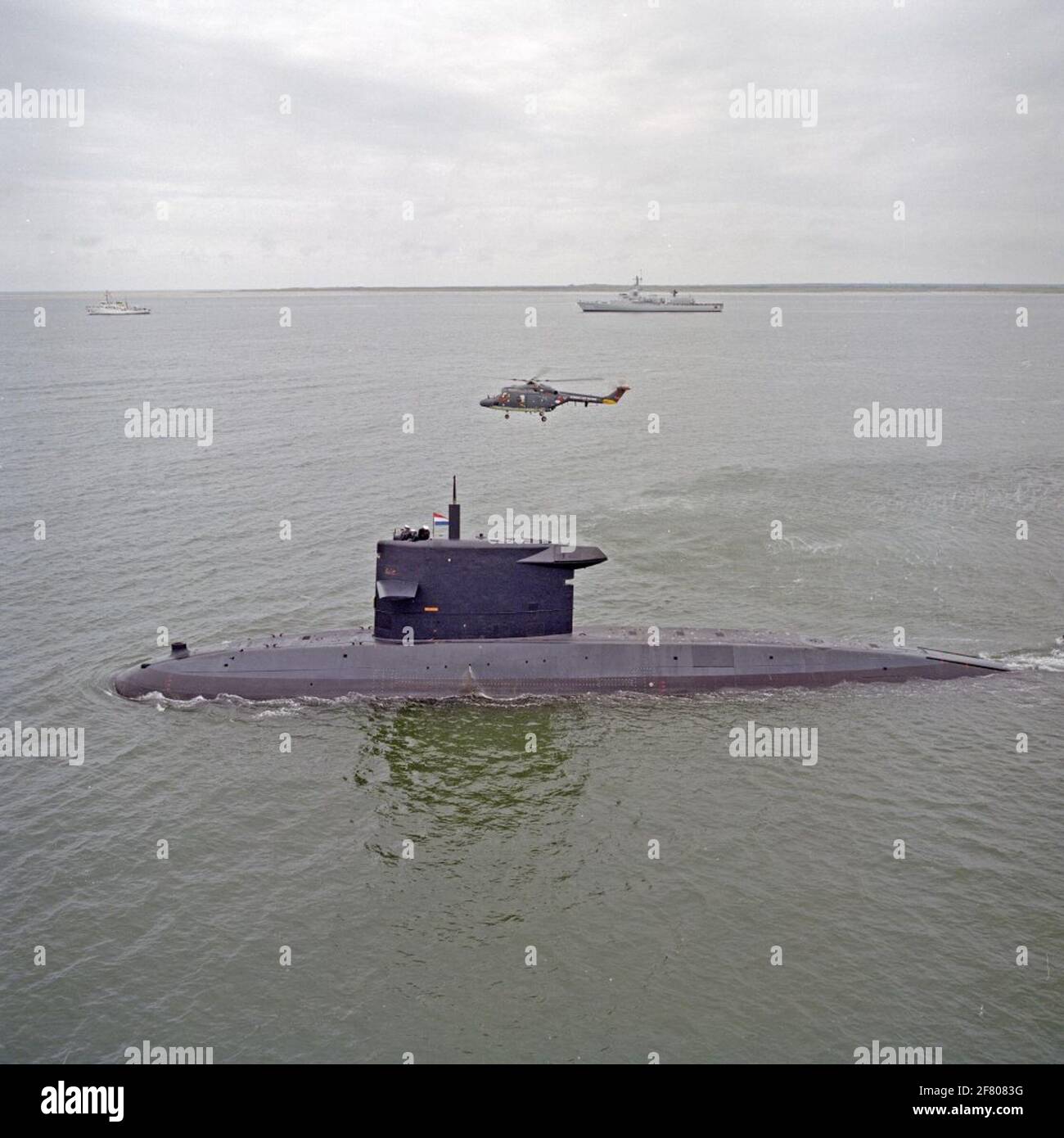 The submarine Hr.Ms. Sea lion (1990-) with a Westland Lynx H-14 ...