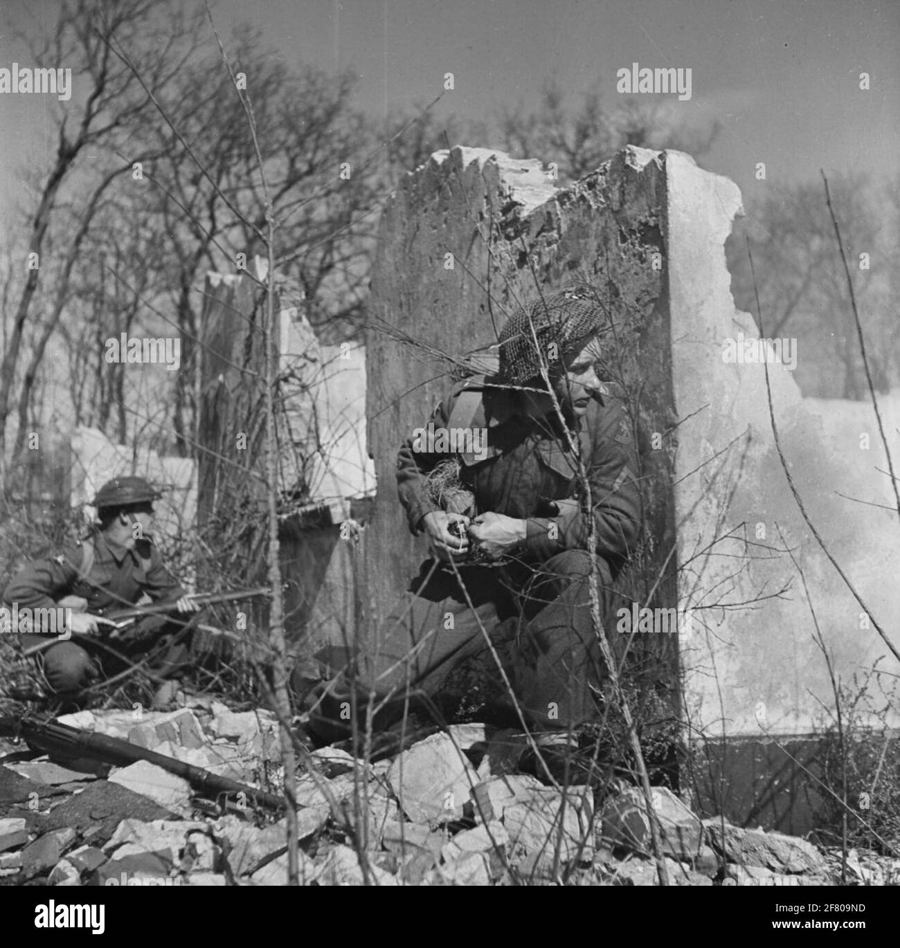 Two infantrymen during a field service exercise. The front man is ready ...
