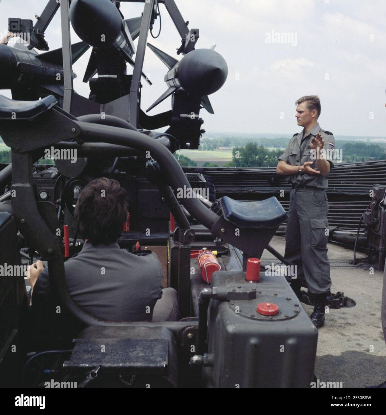 Transferring Hawk missiles to a pallet using the loader transporter ...