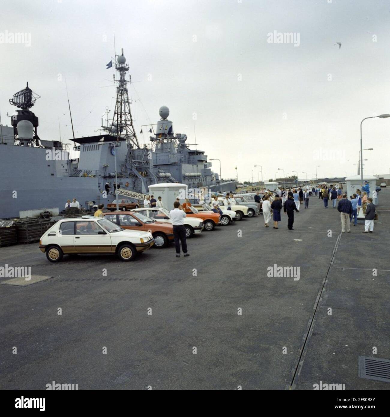 Oldtimers on the quay arranged with Frigates and Destroyers in the ...
