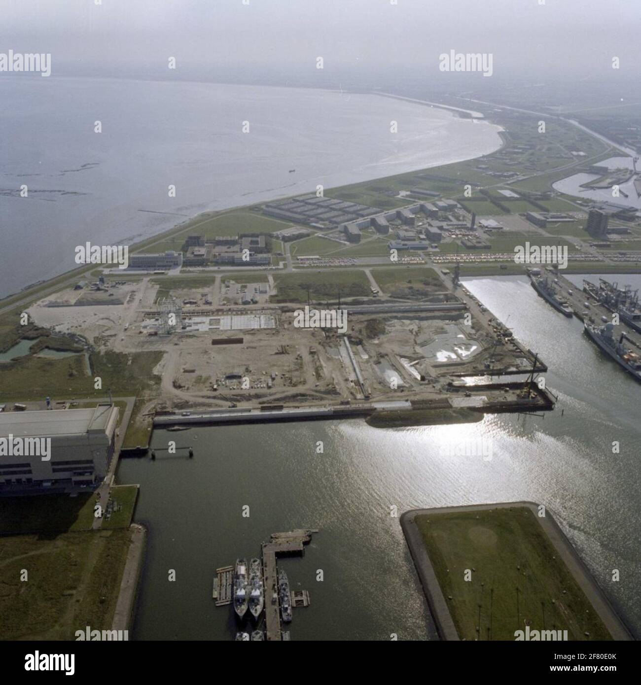 Aerial view of the new port Den Helder. On the left the covered dock of ...