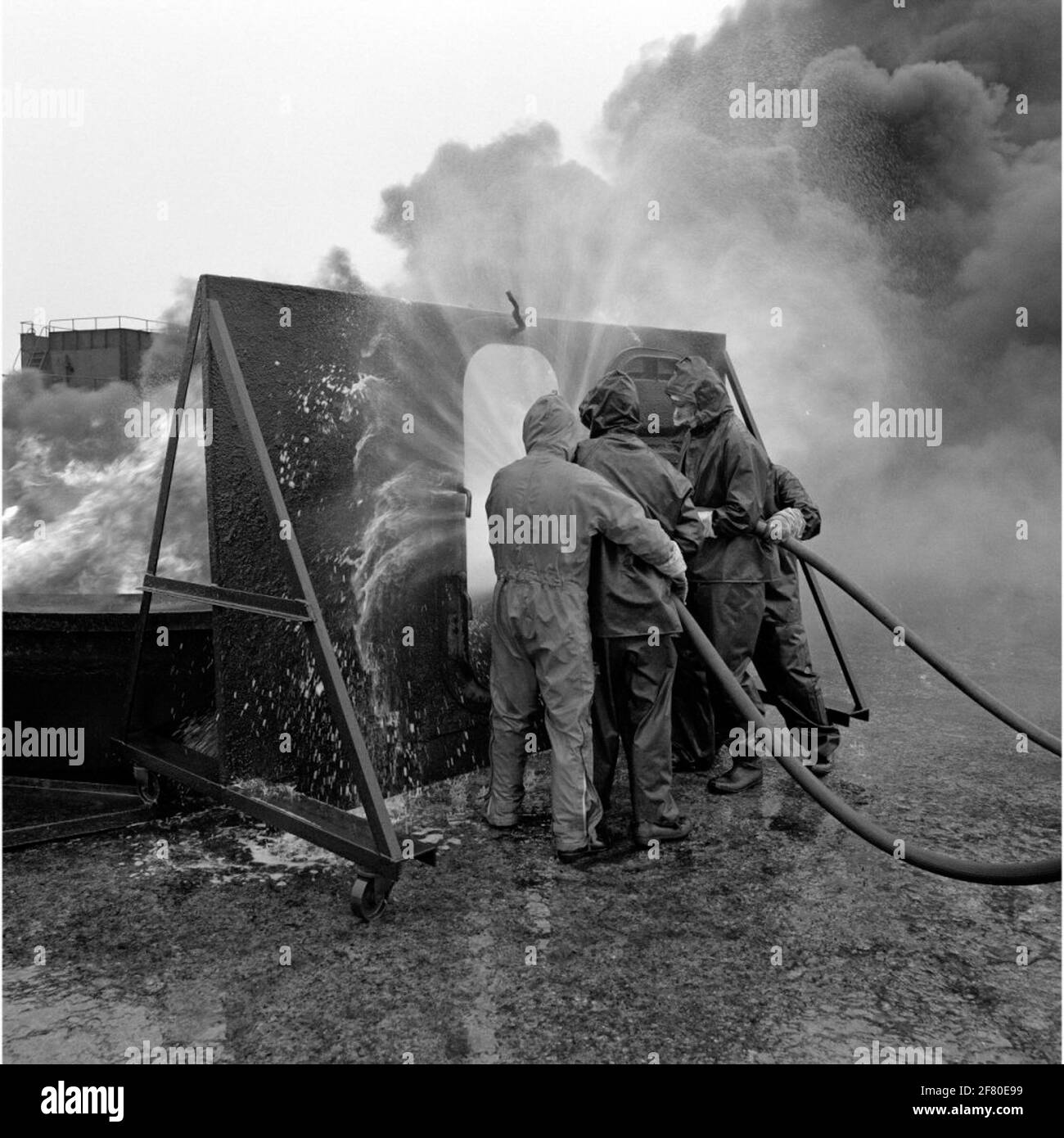 Exercise fire fighting at the school for NBCD (nuclear, organic ...