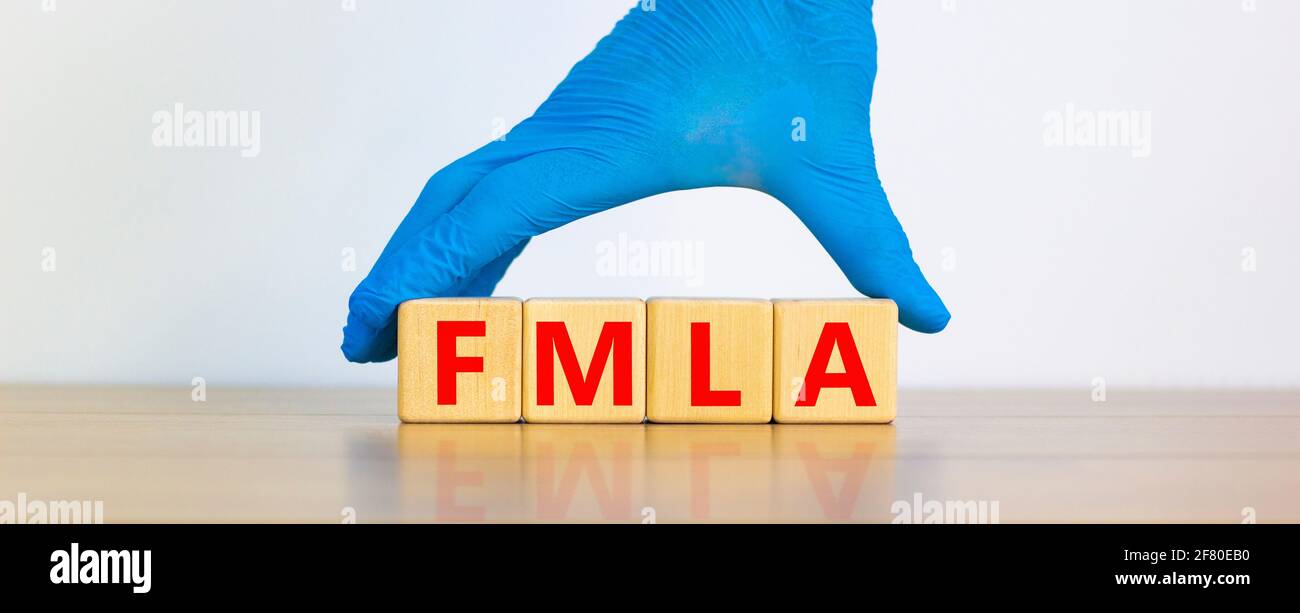 FMLA, family medical leave act symbol. Concept words 'FMLA, family ...