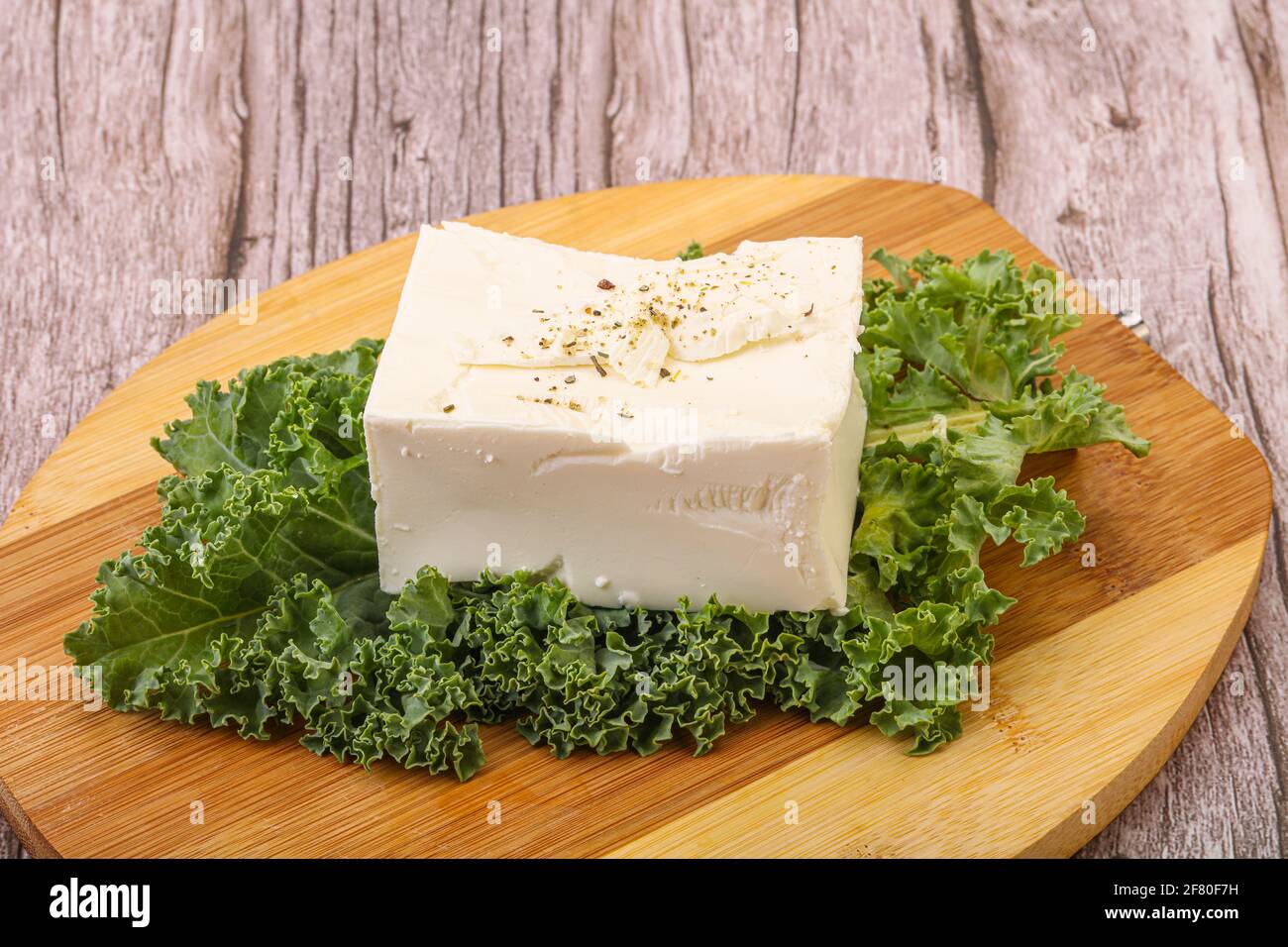 Traditional tasty Greek Feta soft cheese brick Stock Photo - Alamy