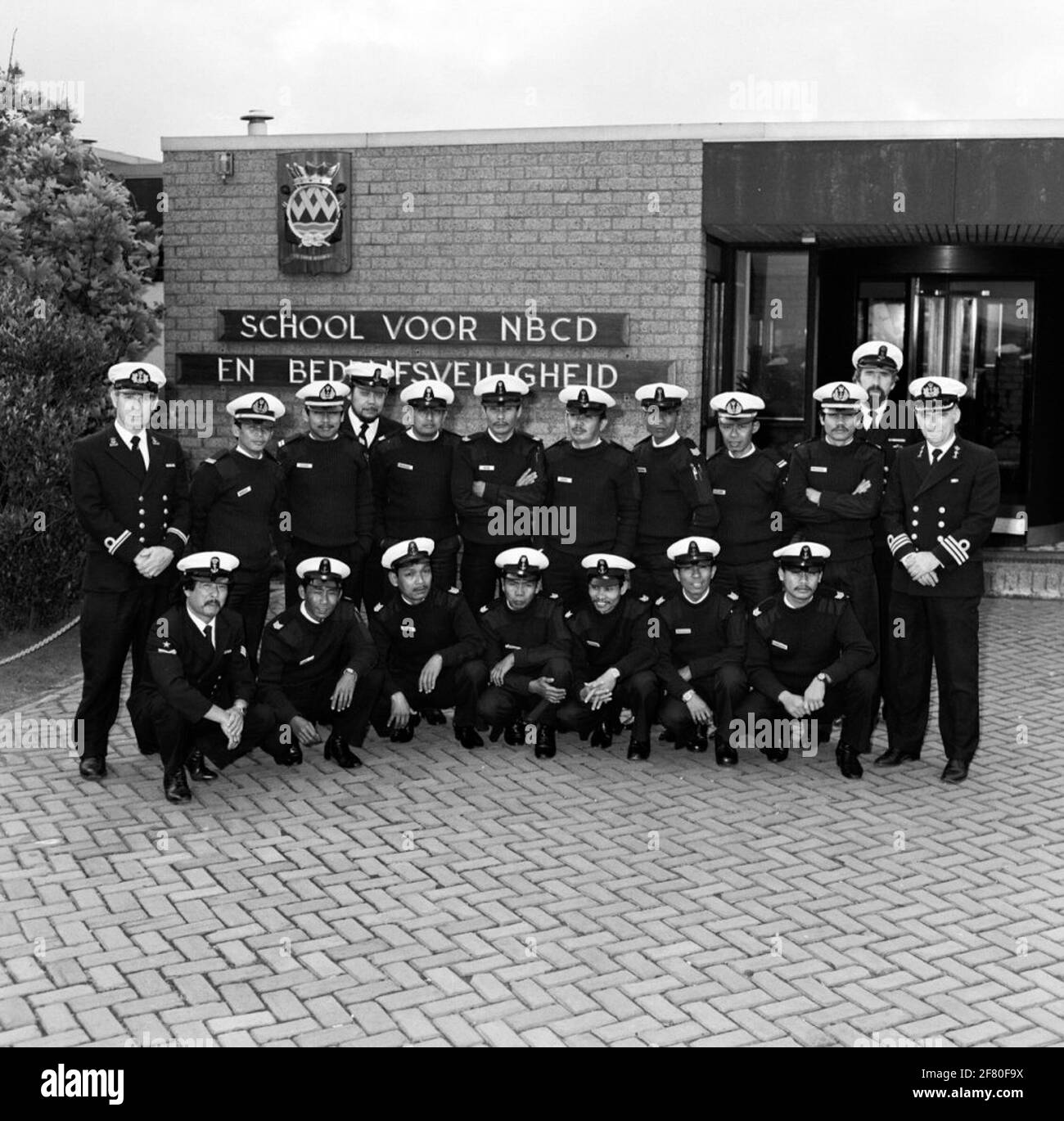 Indonesian naval crew follows a training at the school for NBCD and ...