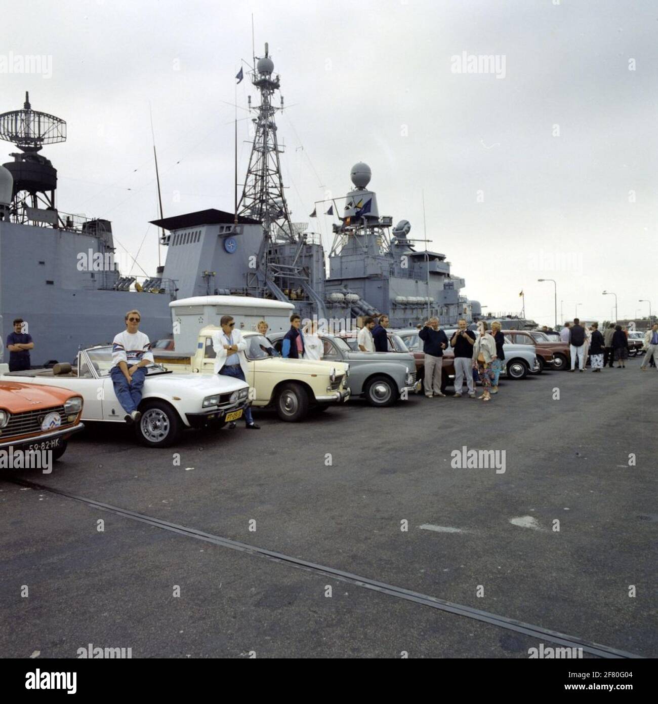 Oldtimers on the quay arranged with Frigates and Destroyers in the ...
