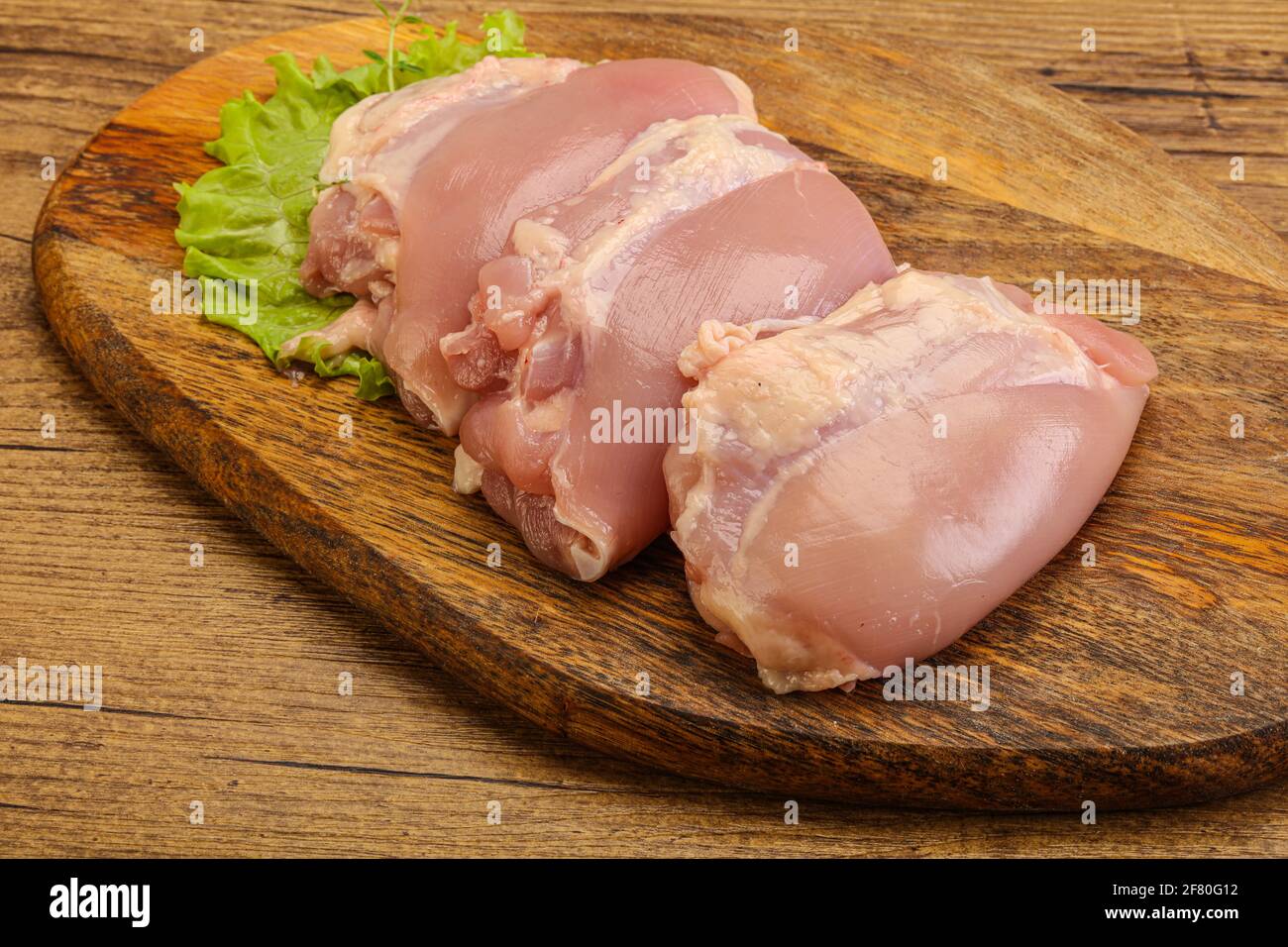 Raw chicken boneless and skinless leg for cooking Stock Photo - Alamy