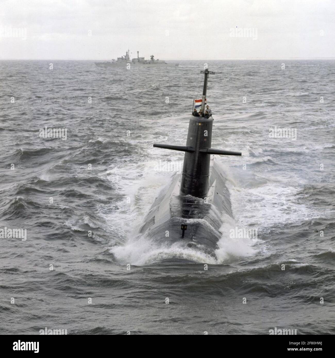 The submarine Hr.Ms. Tiger shark (1972-1995) with a S-frigate in the ...