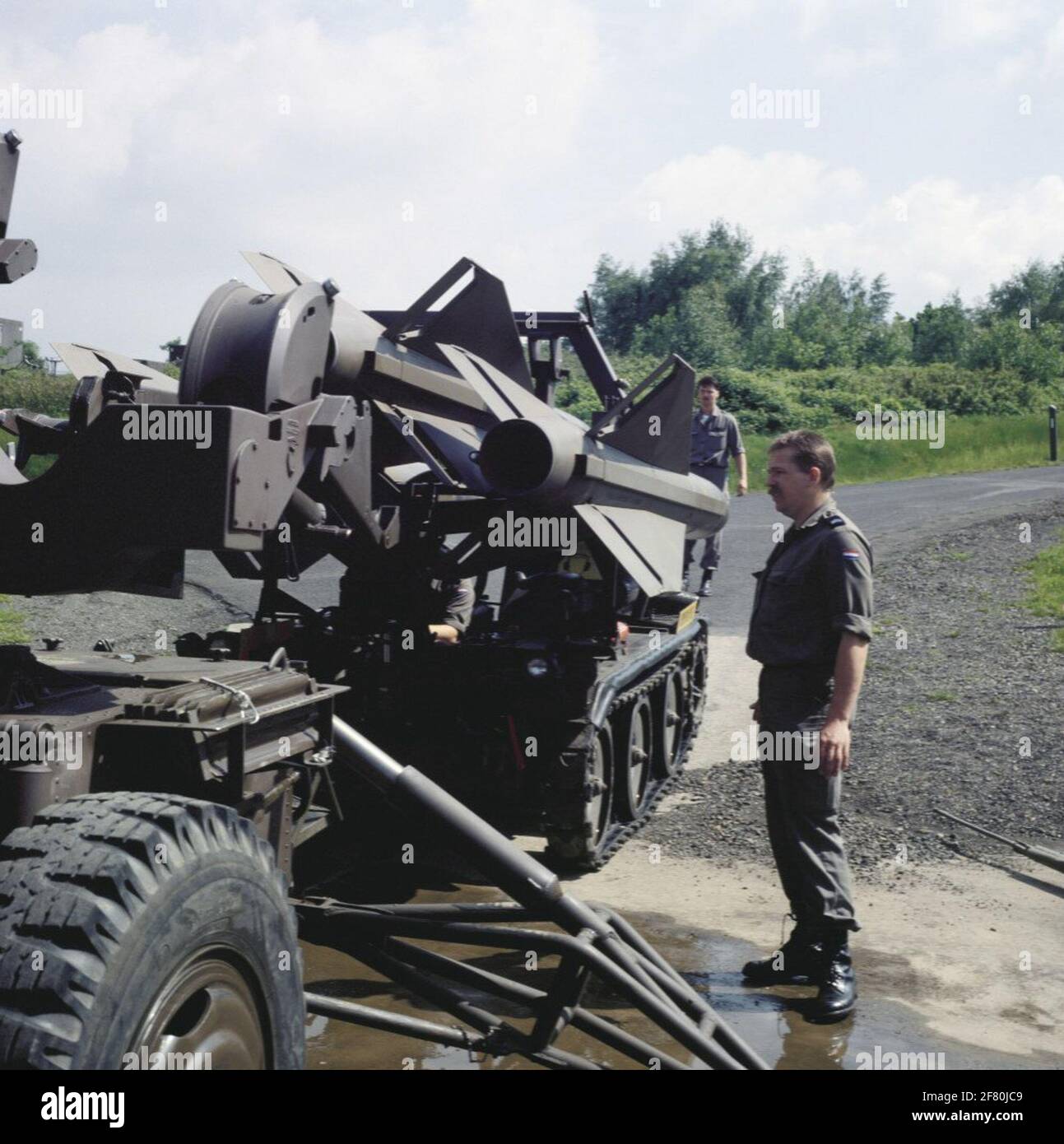 Transferring Hawk missiles to a pallet using the loader transporter ...