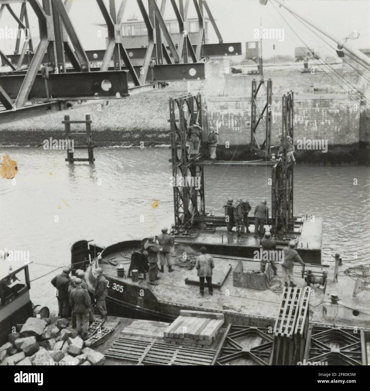 Construction of a bridge at Kornwerderzand by the genius Stock Photo ...