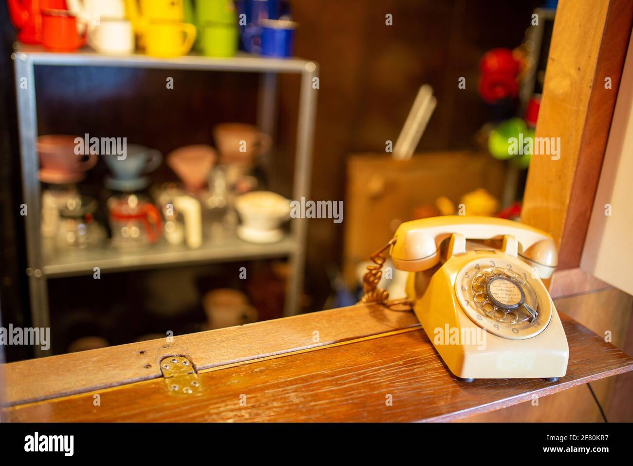 Retro telephone inside grocery store Stock Photo - Alamy
