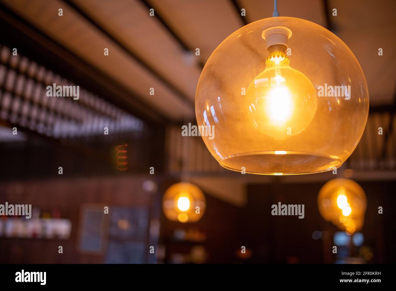 tungsten light bulb inside cafe Stock Photo - Alamy