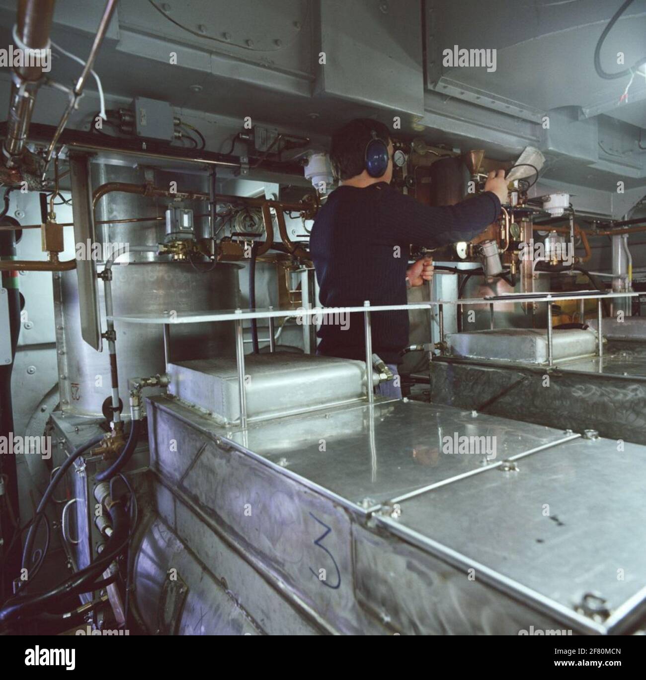 The engine room aboard a tripartite mine hunter from the Alkmaar class ...