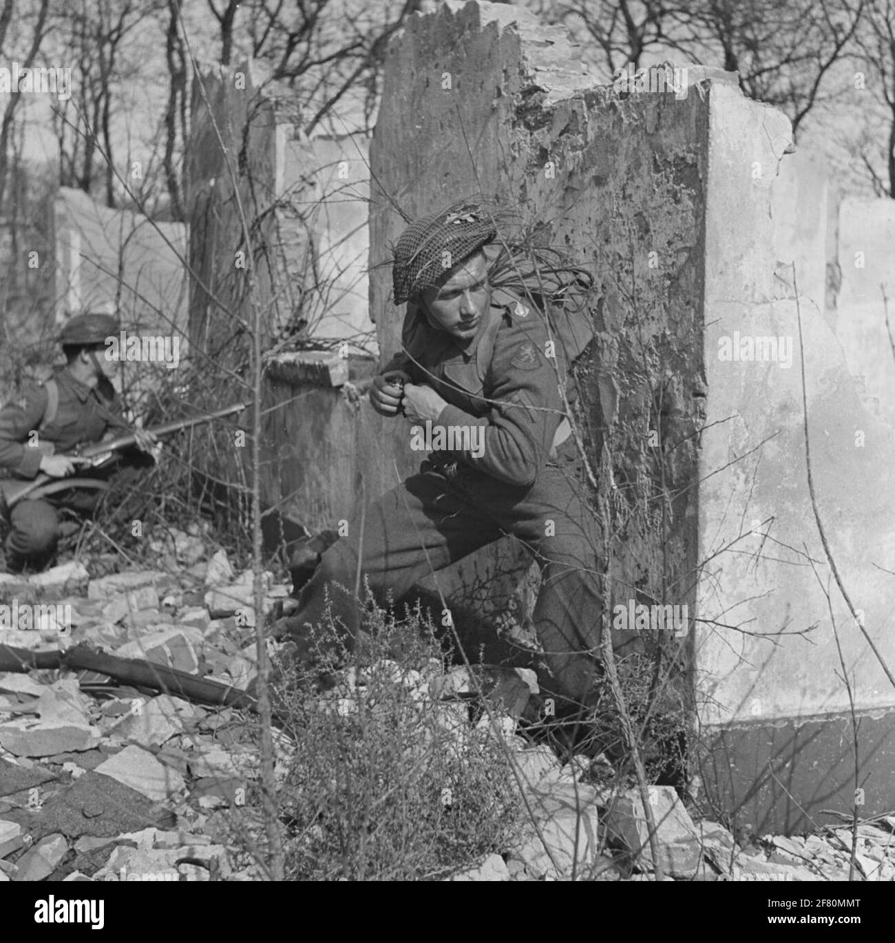Two infantrymen during a field service exercise. The front man is ready ...