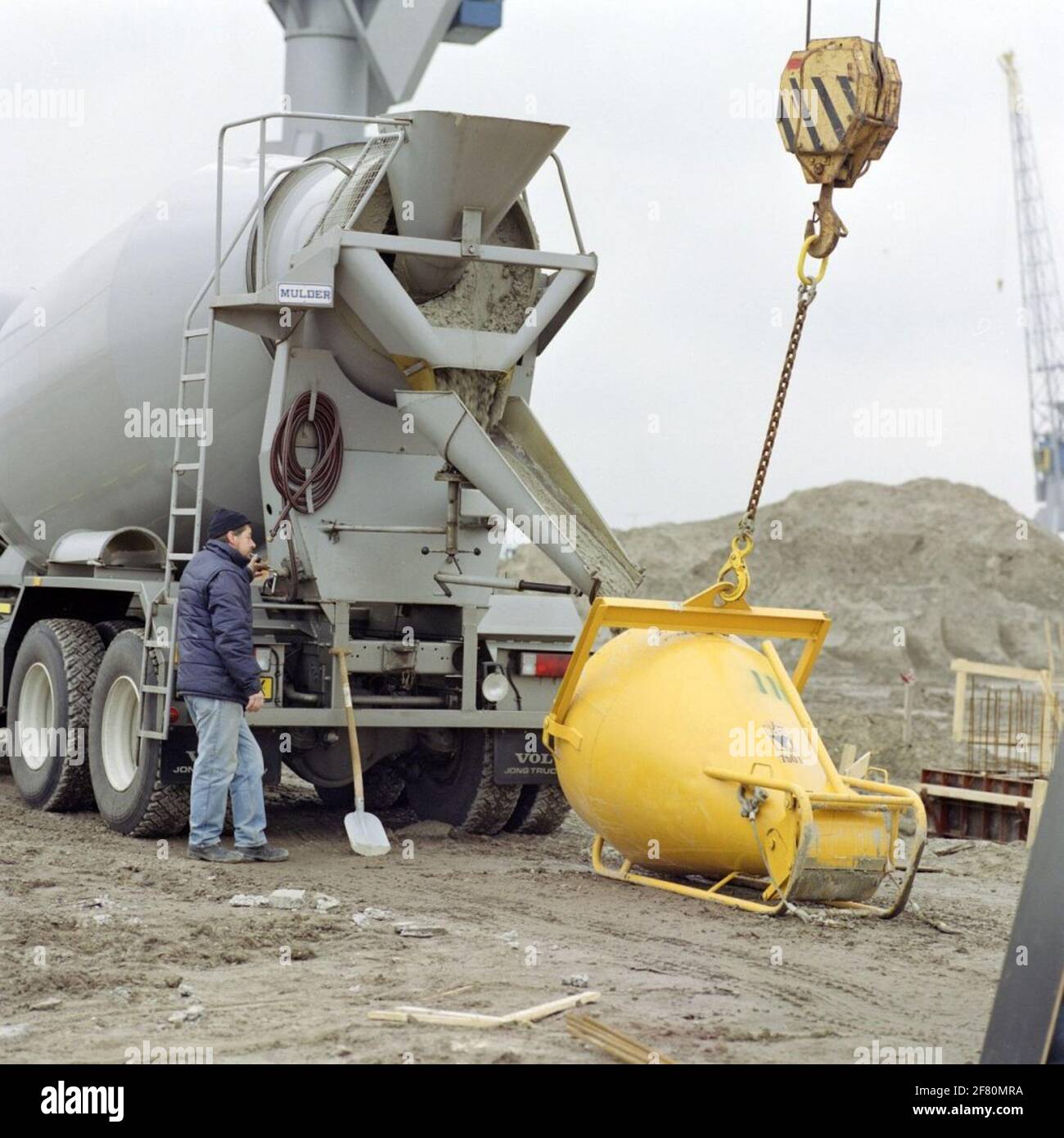 Pouring concrete for the new power / water plant for the new port in ...