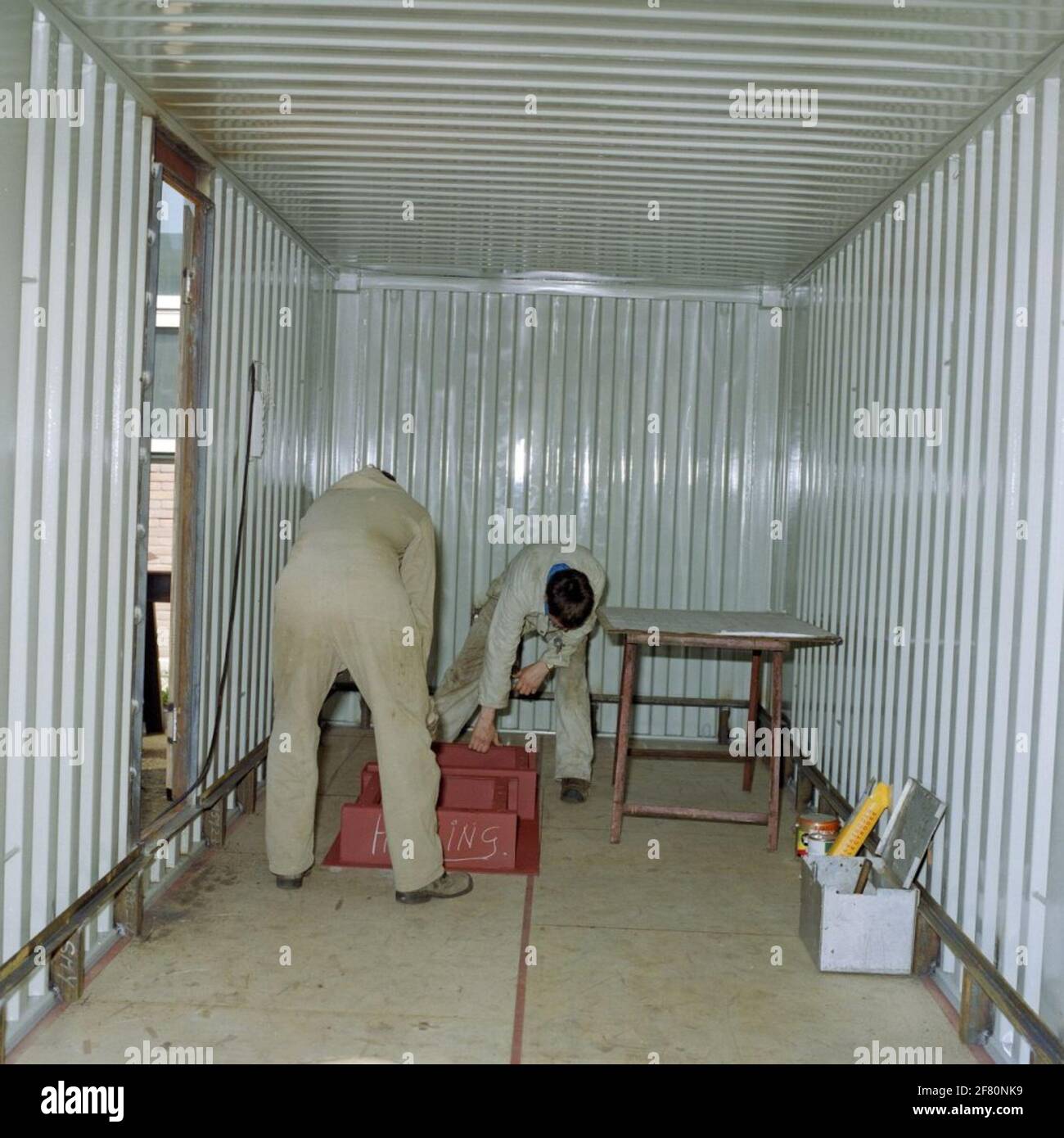Paints and furnishing an instrument container at the Rijkswerf in May ...