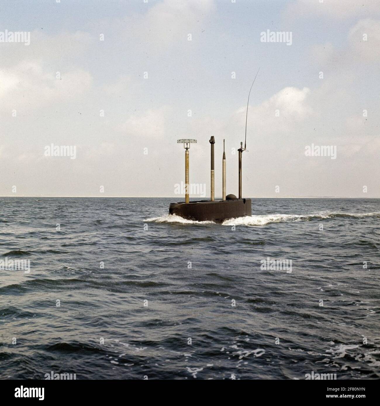 The submarine Hr.Ms. Dolphin (1960-1985) with the tower just above ...