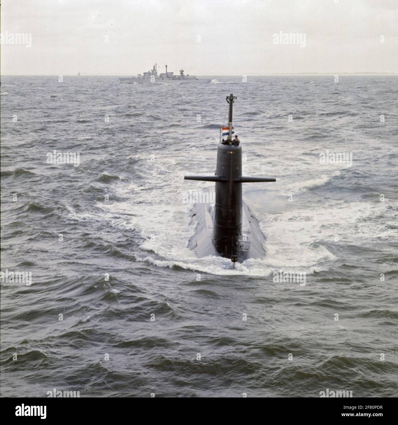 The submarine Hr.Ms. Tiger shark (1972-1995) with a S-frigate in the ...