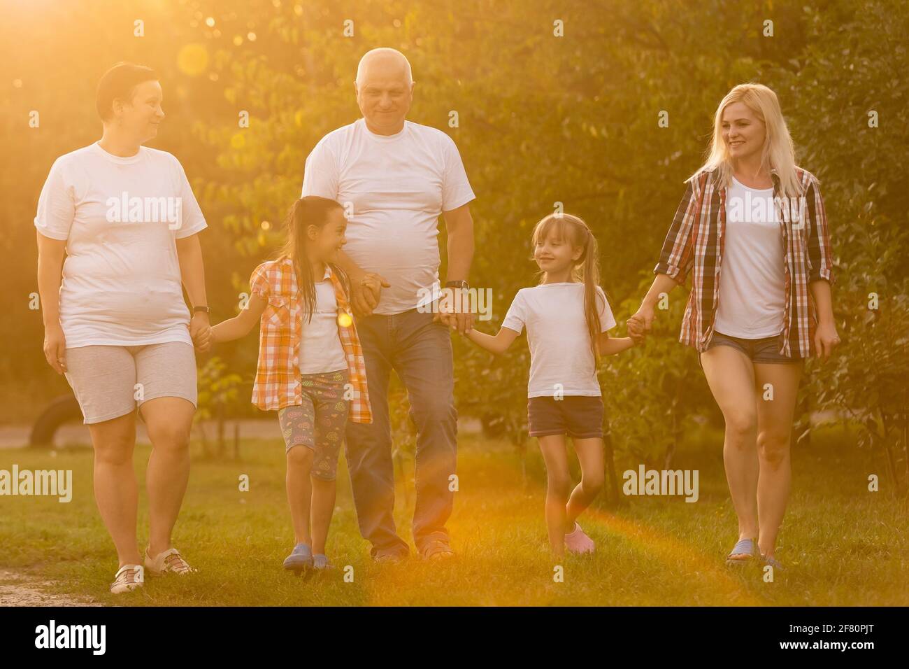 Family Walking Dog Togetherness Nature Concept Stock Photo - Alamy