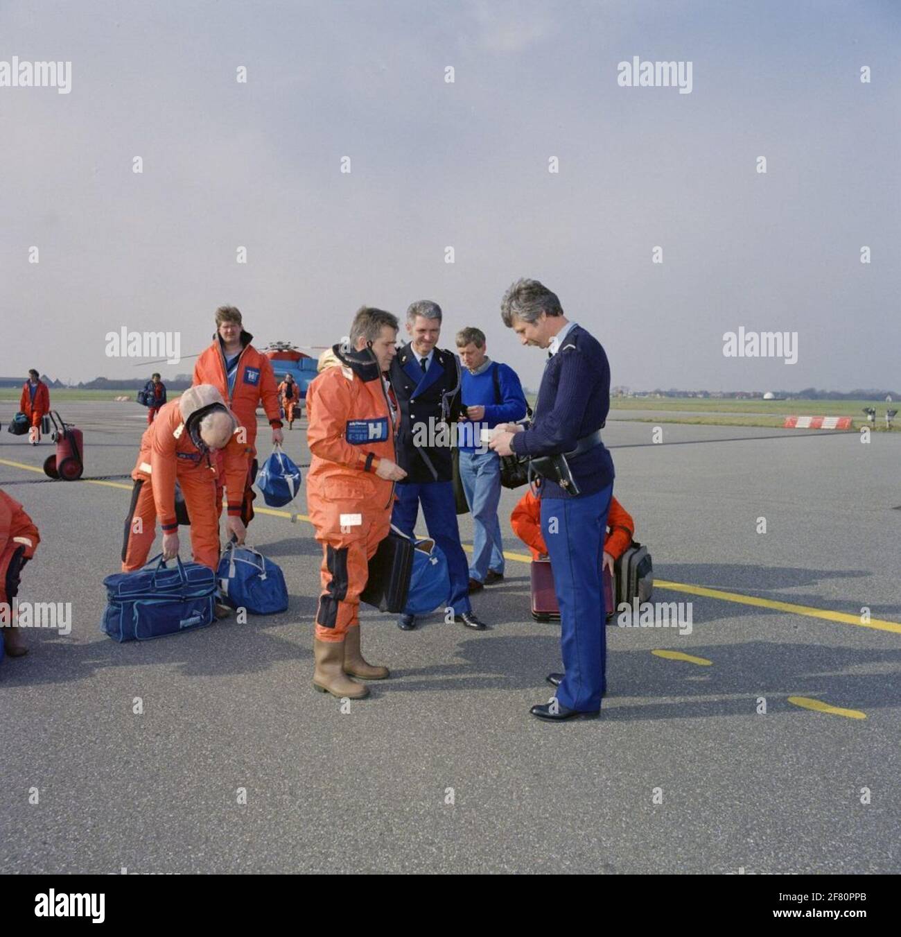 Staff (blue uniform, right) of the Marechaussee Brigade Den Helder in ...