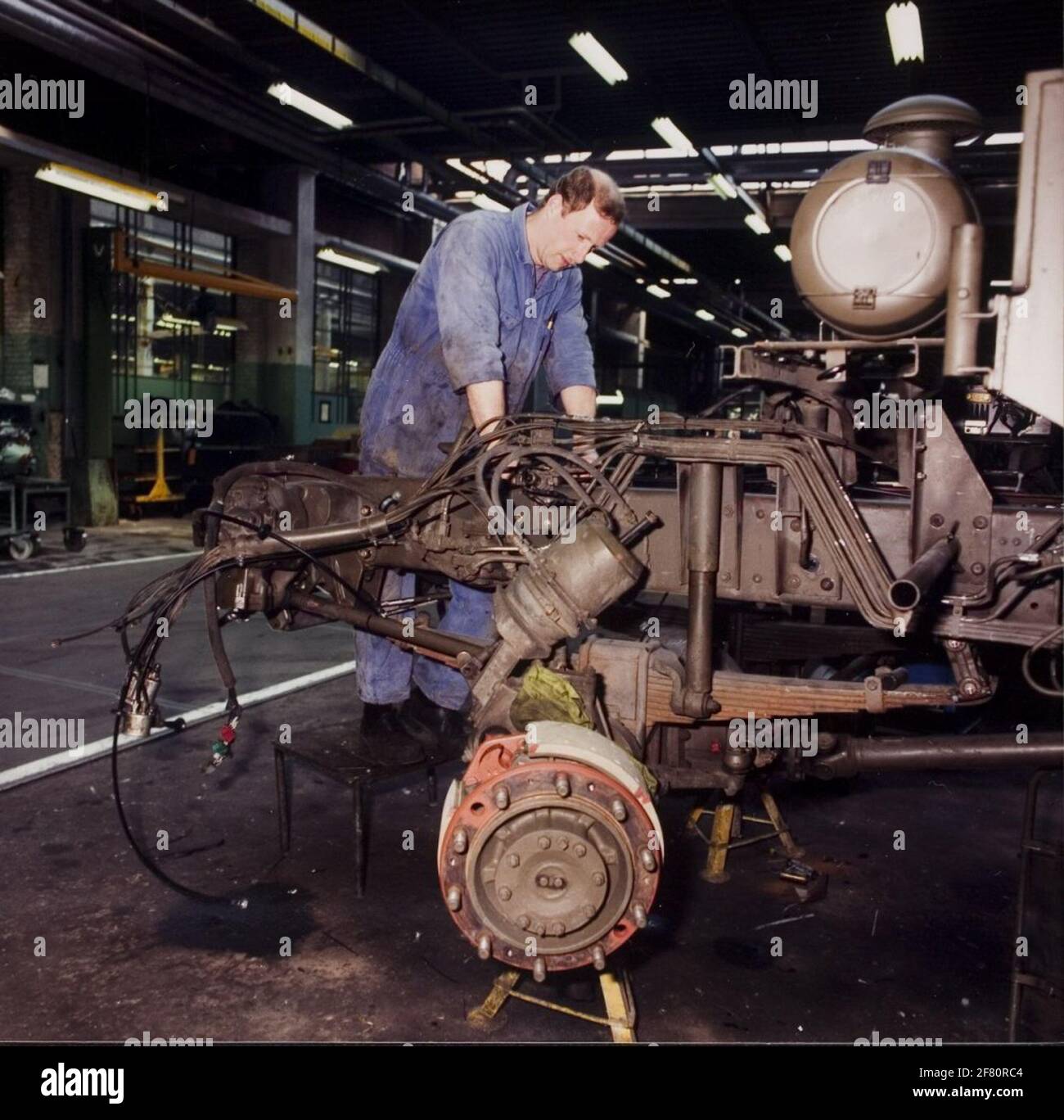 A mechanic at work at a large revision to a DAF leg truck YA-4442. The ...