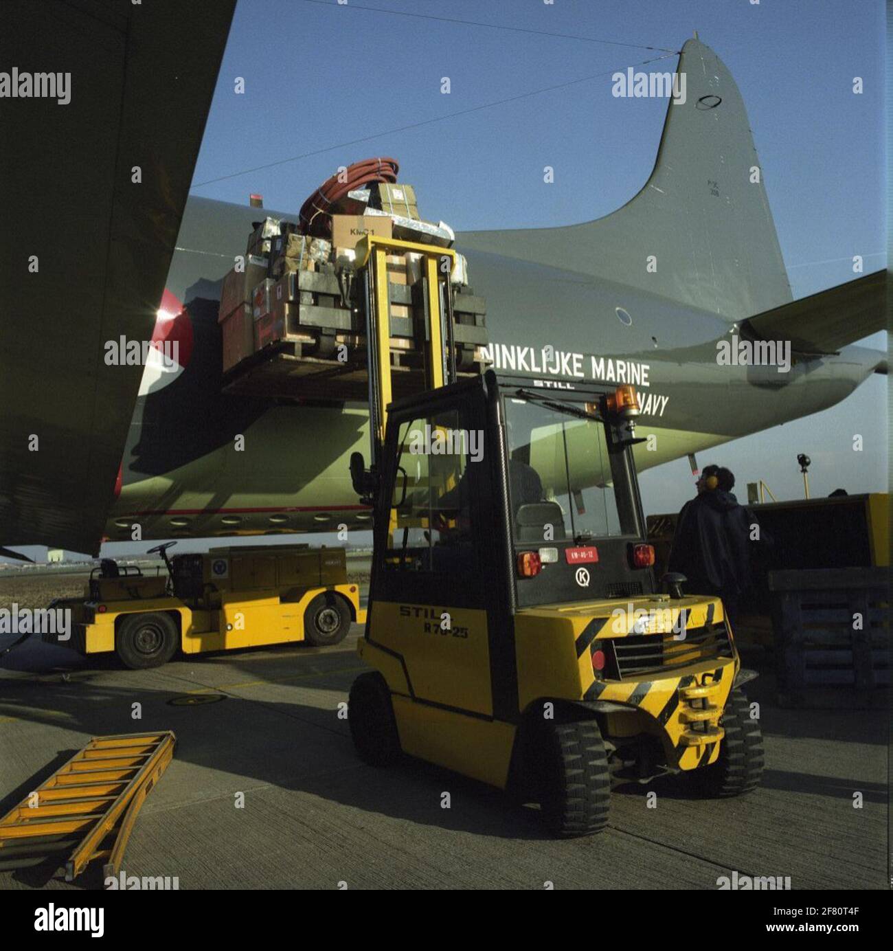 Goods load goods in a transport plane. The operation desert storm in ...