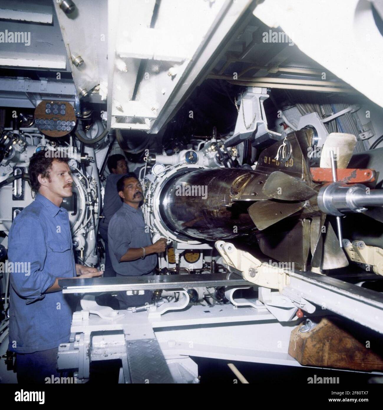 Loading torpedoes in the submarine Hr.Ms. Walrus (ex-USS Icefish, 1953 ...