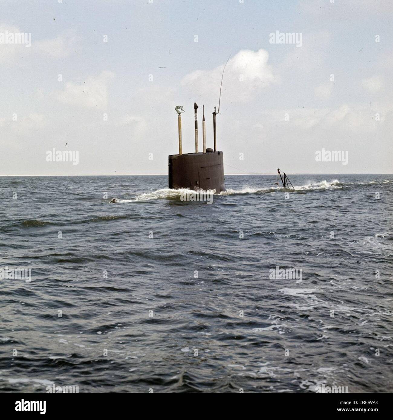 The submarine Hr.Ms. Dolphin (1960-1985) with the tower just above ...