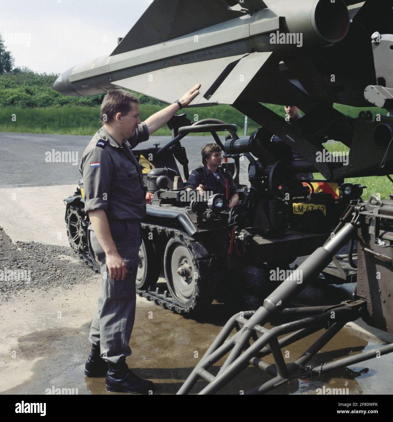 Missile transport. Transfer from Hawk missiles to a pallet using the ...