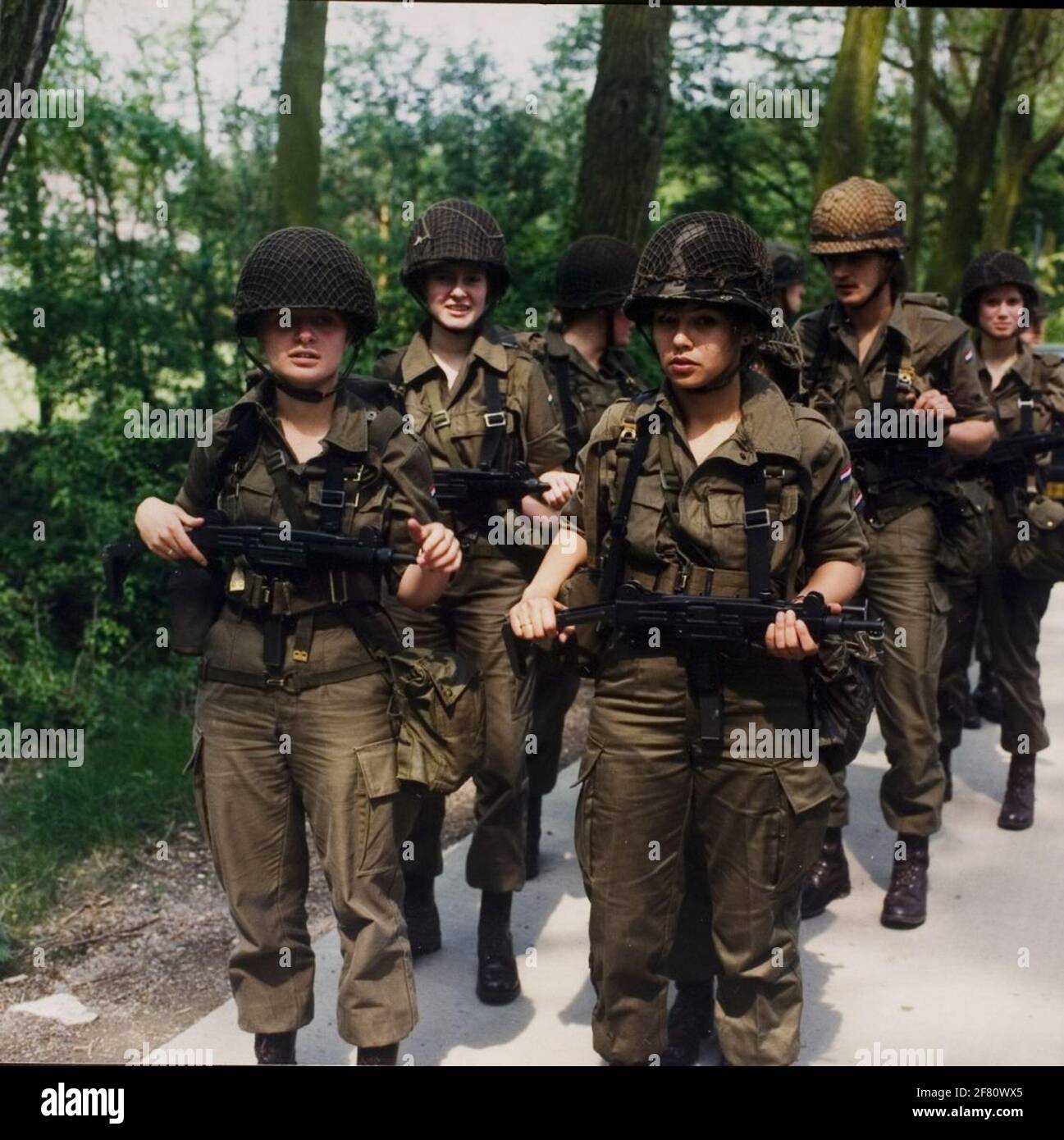 A number of women-soldiers (armed with UZI) is ready for a Mars ...