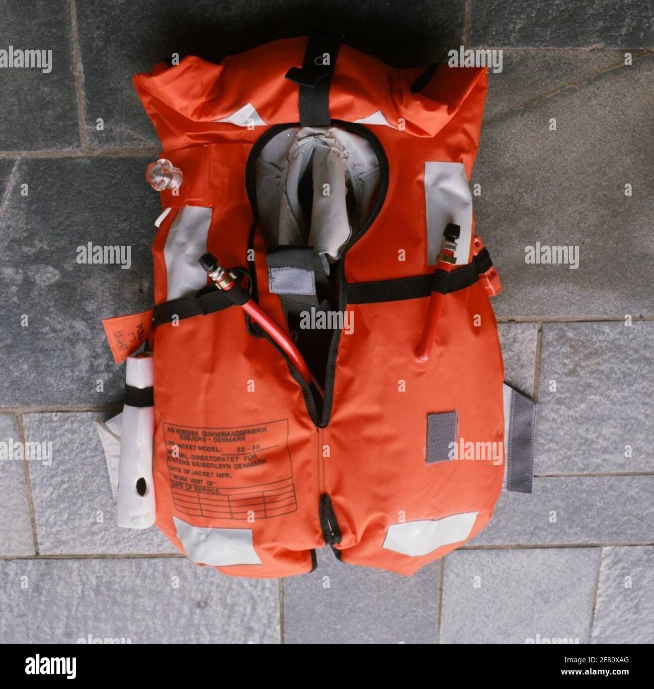 A life jacket (rescue vest) in use at airplane quadron 860 (vsq 860) by ...